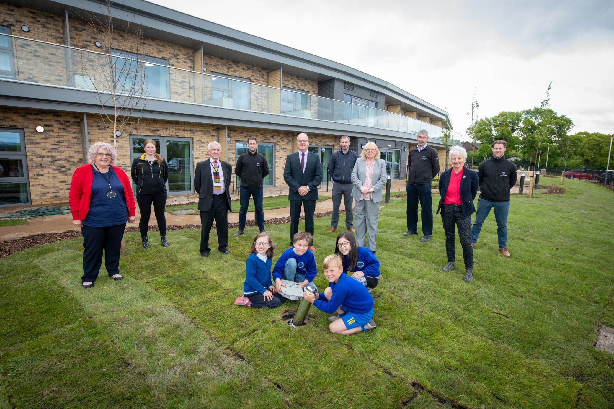 Schoolchildren bury time capsule to celebrate completion of Marleyfield ...